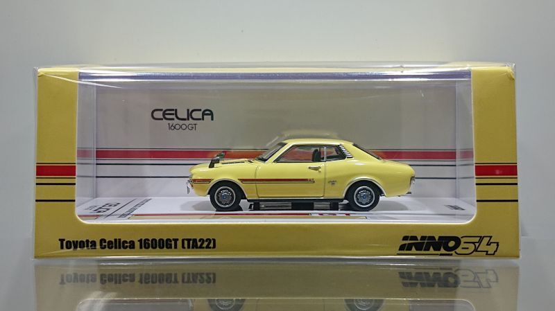 INNO Models 1/64 Toyota Celica 1600GT (TA22) Yellow - AXELLWORKS HOBBYTOWN